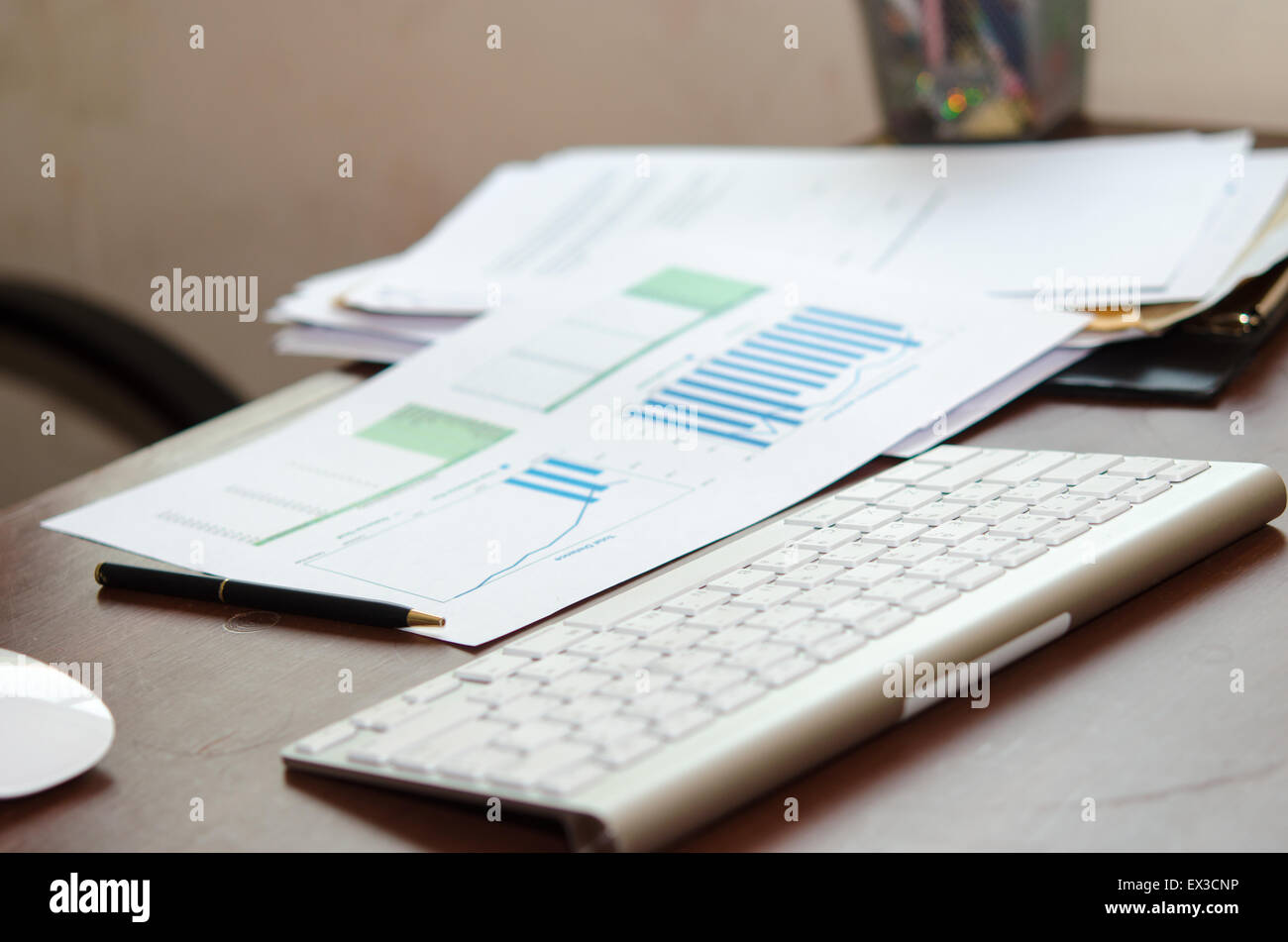 Report on work desk of businessman Stock Photo - Alamy