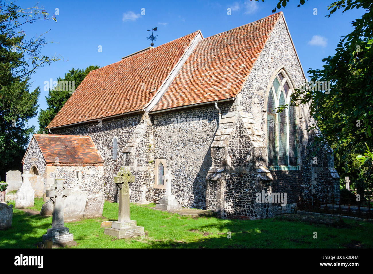 Elmstone Norman church in Kent, England. Stone building with tiled roof ...