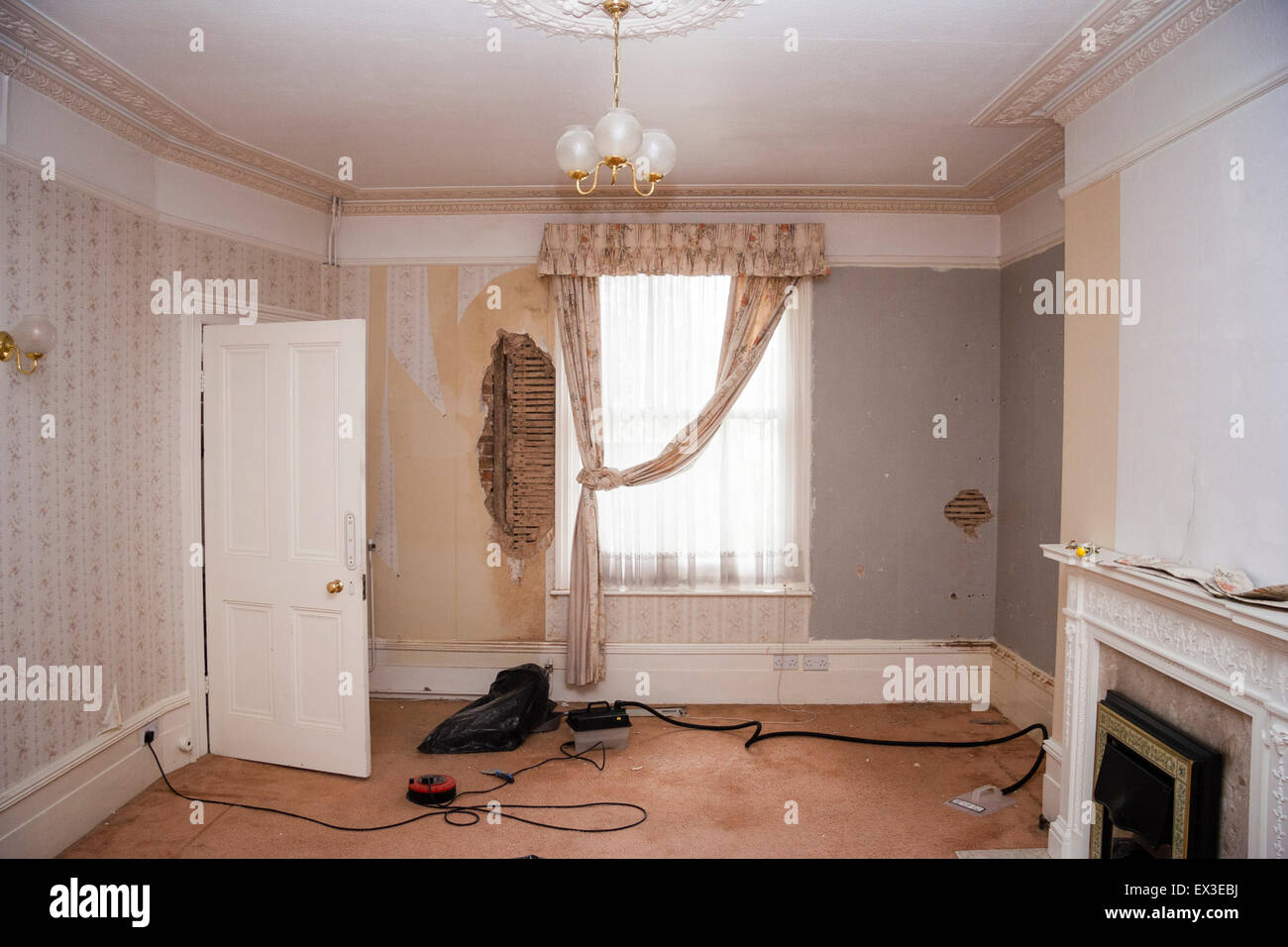 Large interior room with window in an English Victorian house while ...