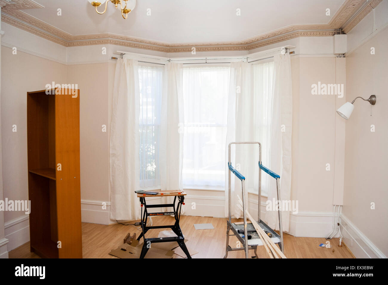 Large interior room with window in an English Victorian house while ...