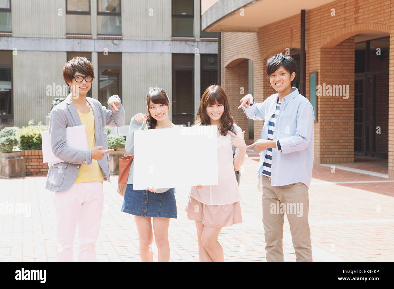 Young female students pose for the camera hi-res stock photography and ...