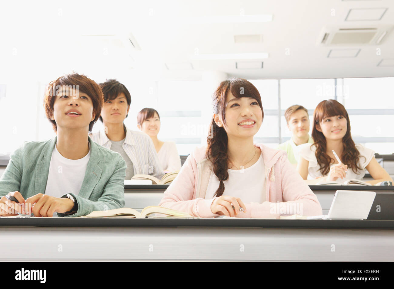 Cute students in class hi-res stock photography and images - Alamy
