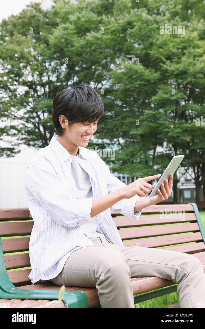 University student in the campus park Stock Photo - Alamy