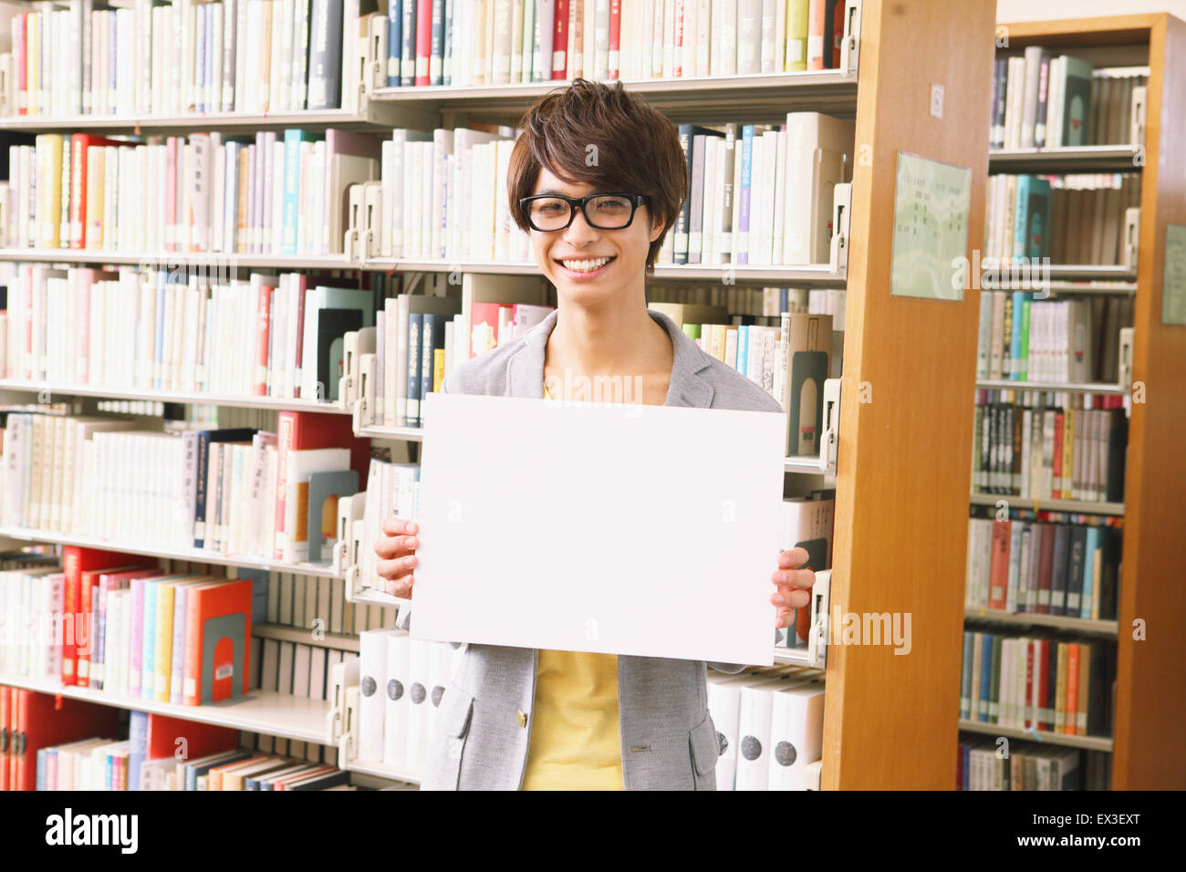 University student in the library Stock Photo - Alamy