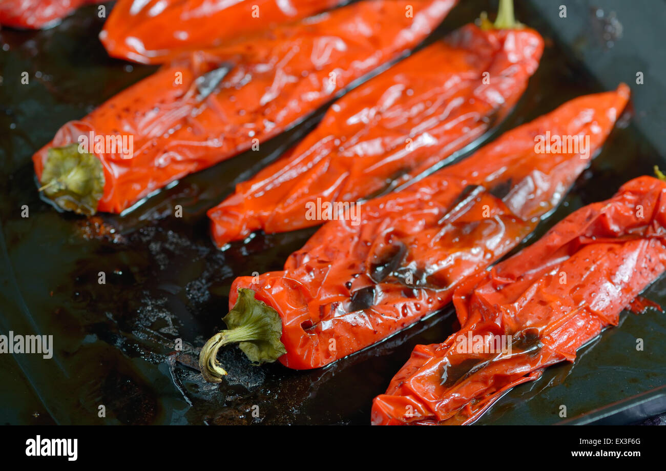 roasted red peppers on steel tray Stock Photo - Alamy