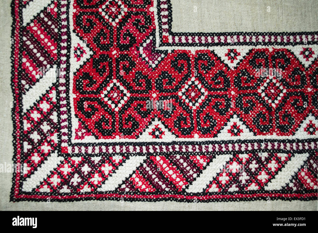 Embroidered cross pattern corner tablecloths on coarse cloth Stock ...