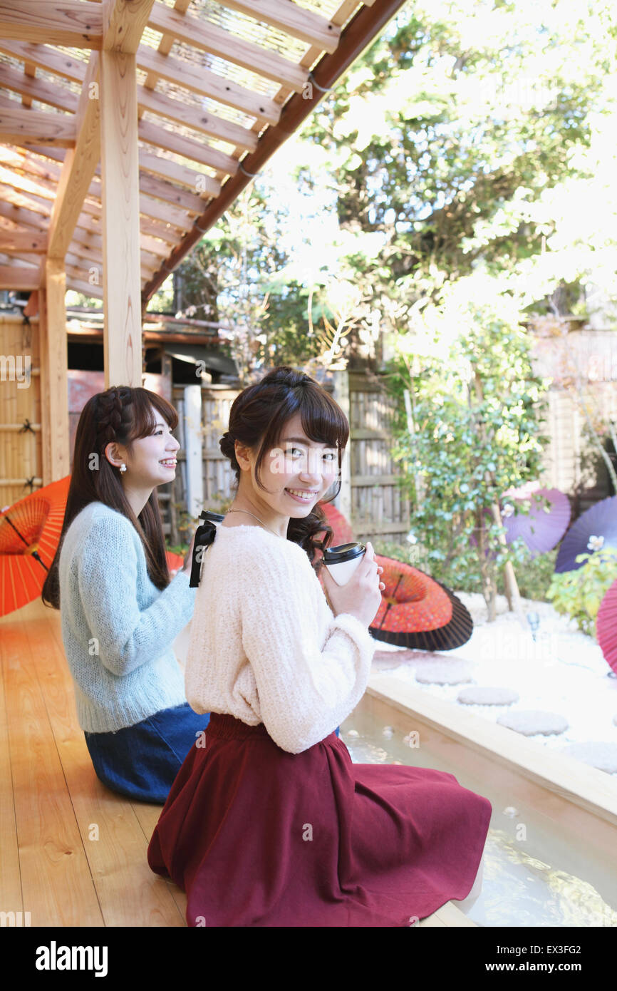 Young Japanese women enjoying foot spa in Kawagoe, Japan Stock Photo ...