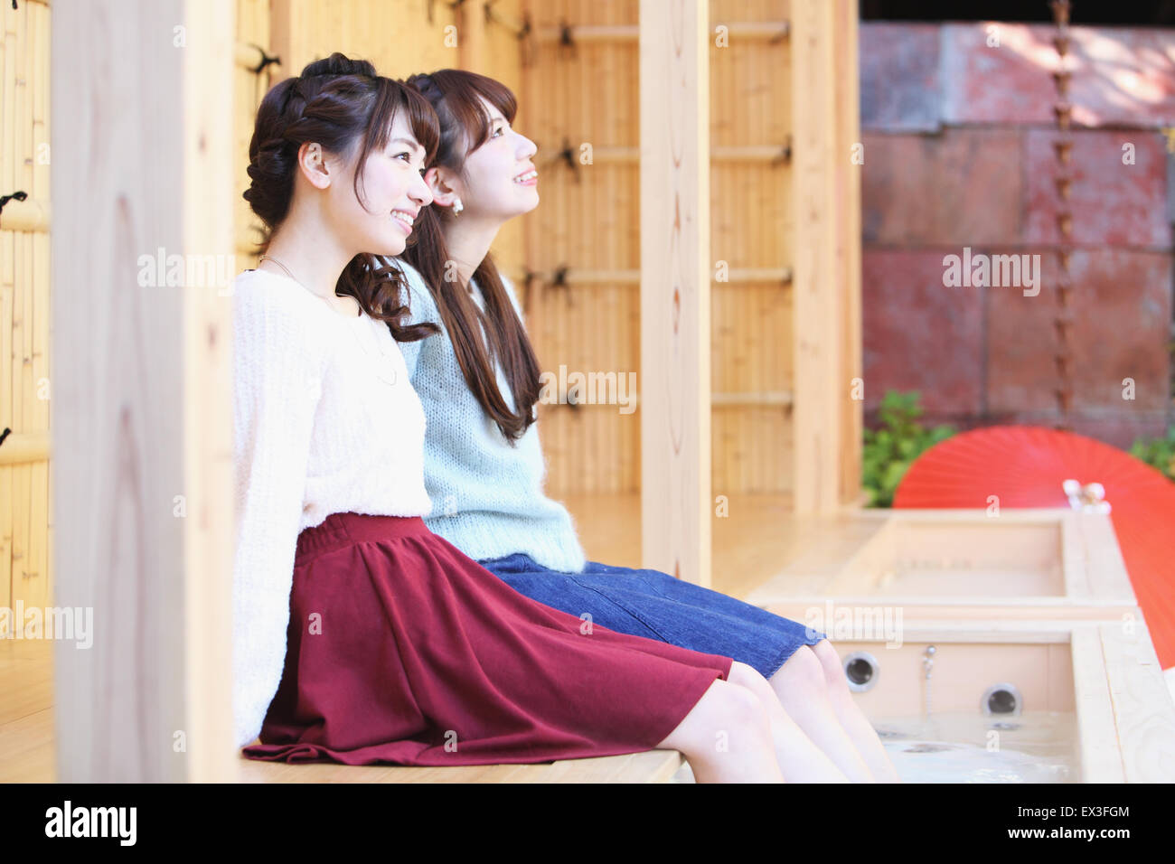 Young Japanese women enjoying foot spa in Kawagoe, Japan Stock Photo ...