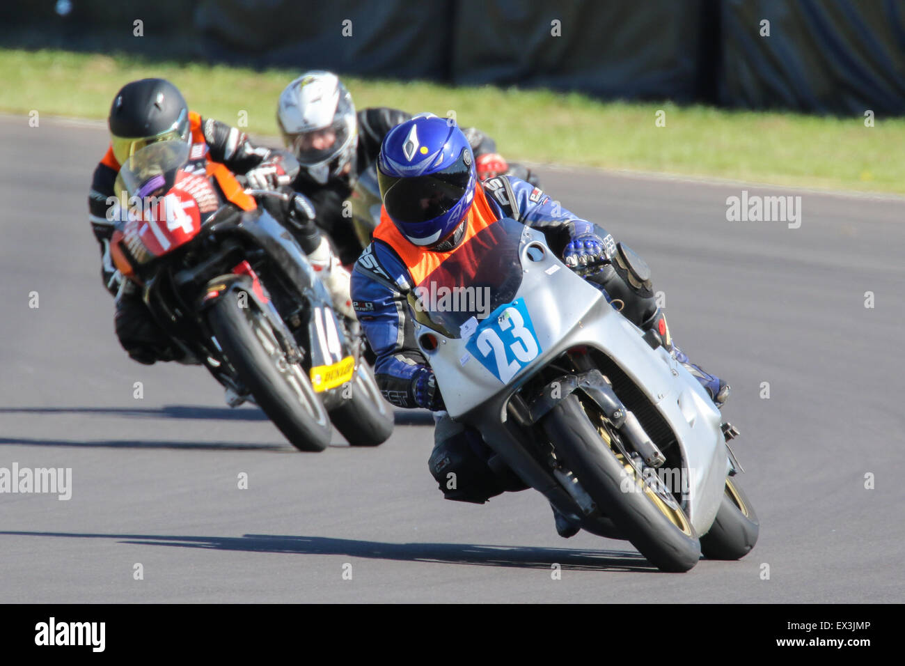 Bikers racing around Castle Combe Circuit for the Grand National Race ...