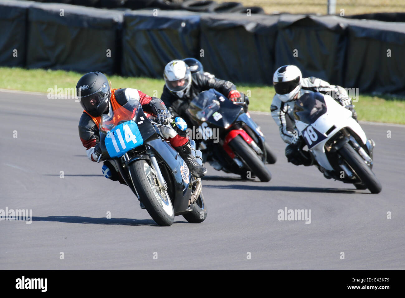 Bikers racing around Castle Combe Circuit for the Grand National Race ...