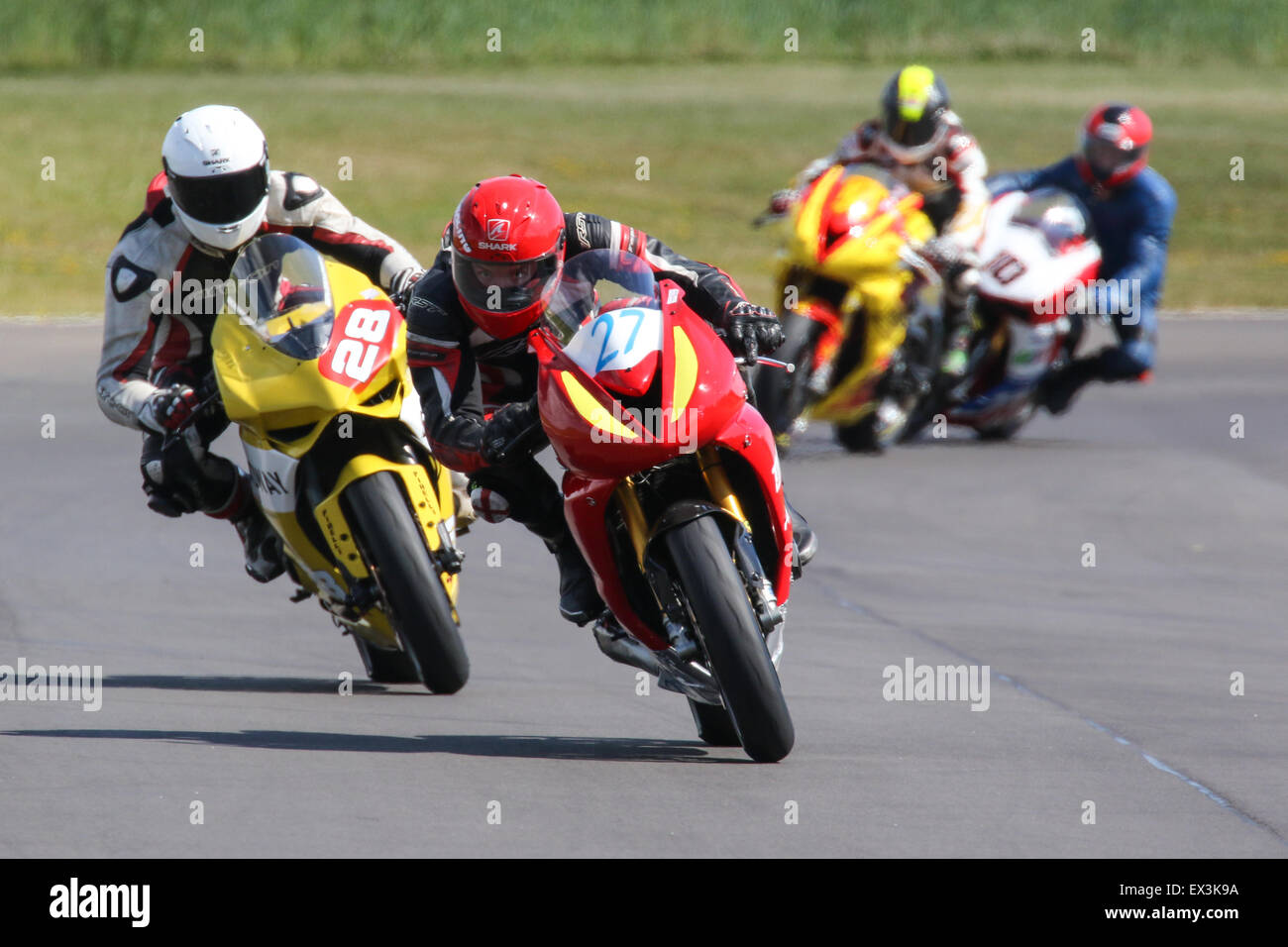 Bikers racing around Castle Combe Circuit for the Grand National Race ...