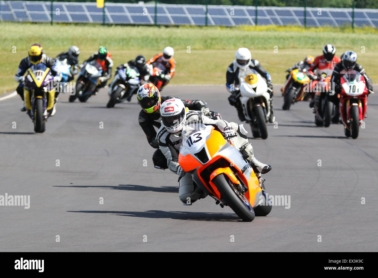Bikers racing around Castle Combe Circuit for the Grand National Race ...