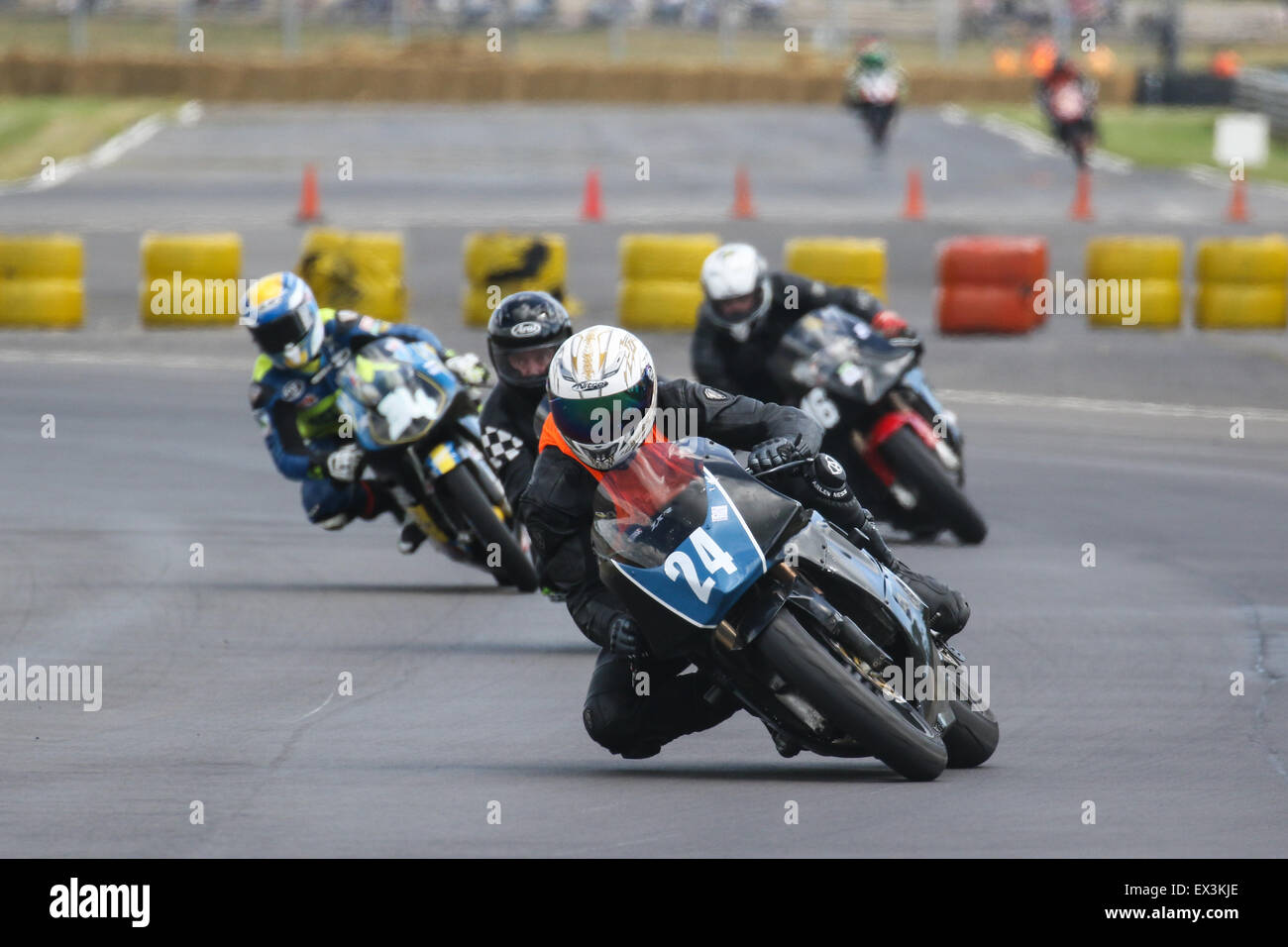 Bikers racing around Castle Combe Circuit for the Grand National Race ...