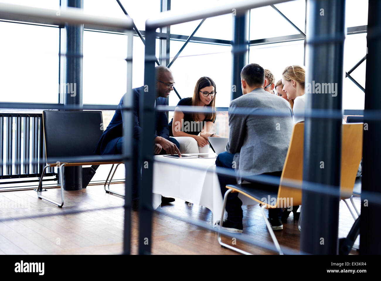 Group executives sitting working together hi-res stock photography and ...