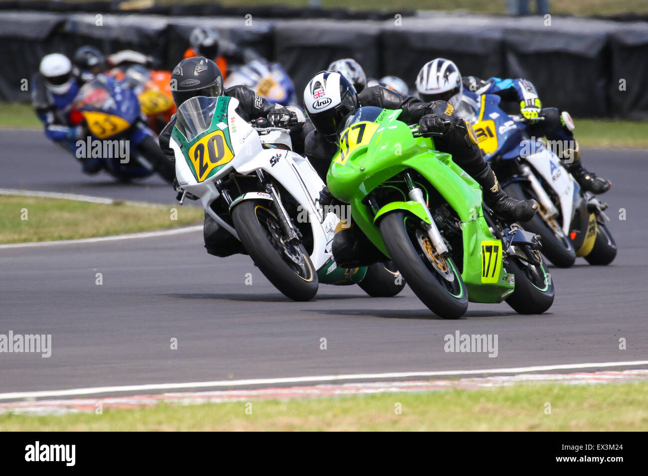 Bikers racing around Castle Combe Circuit for the Grand National Race ...