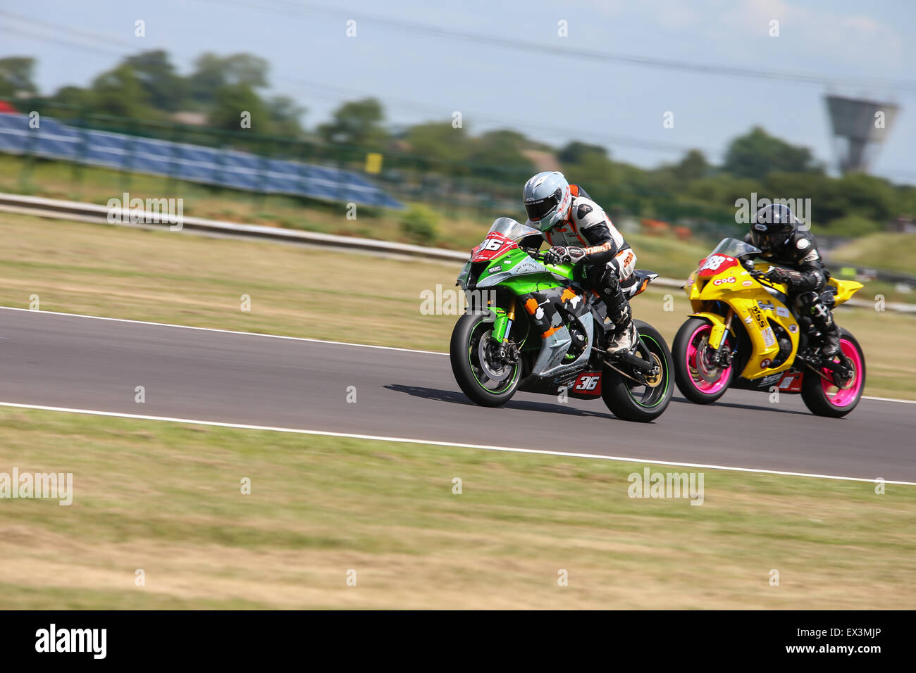 Bikers racing around Castle Combe Circuit for the Grand National Race ...