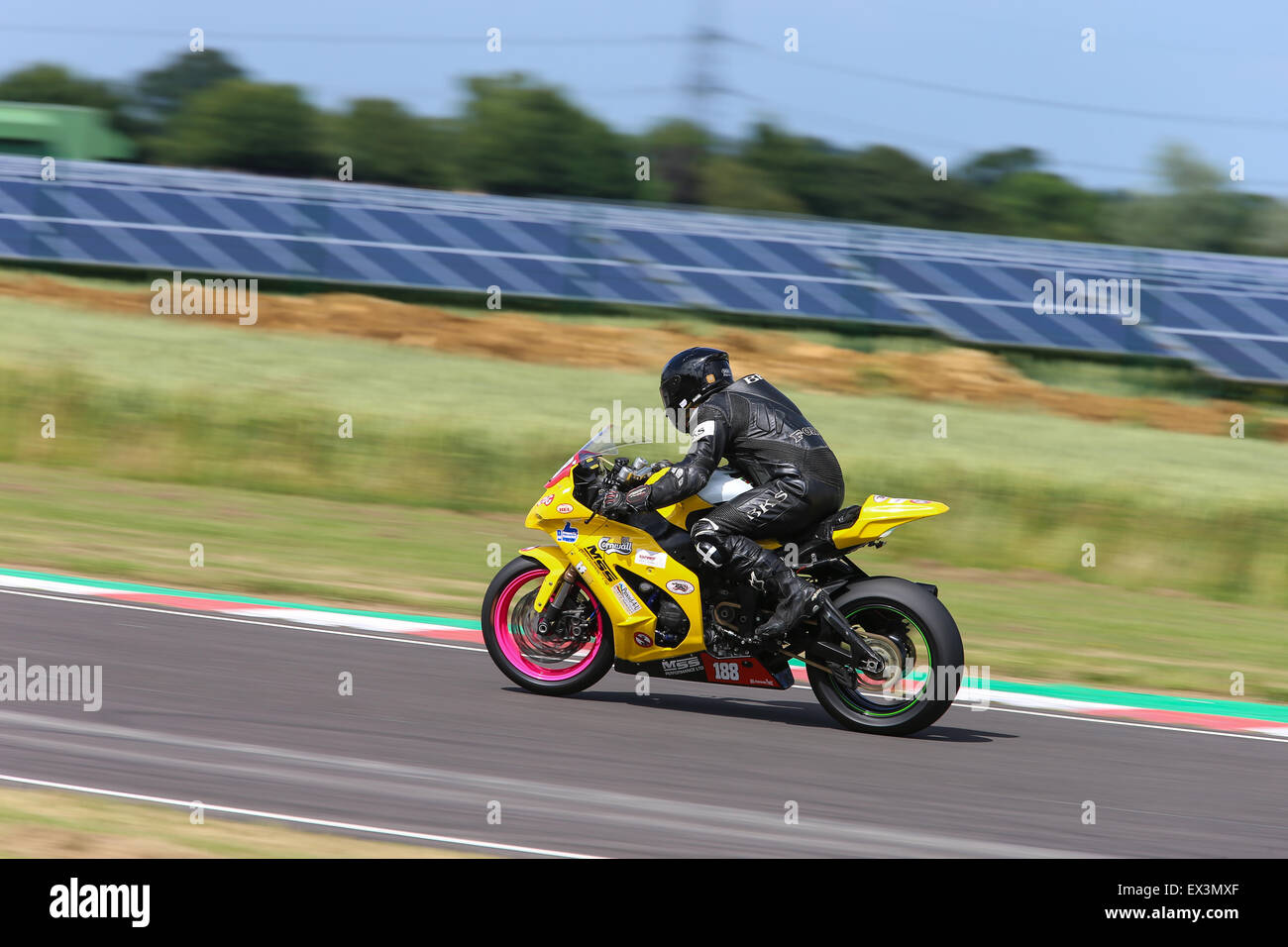 Bikers racing around Castle Combe Circuit for the Grand National Race ...
