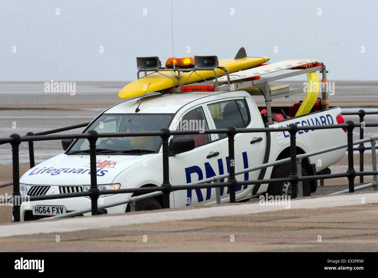 rnli lifeguard sea save rescue rescuer emergency drown drowning water ...