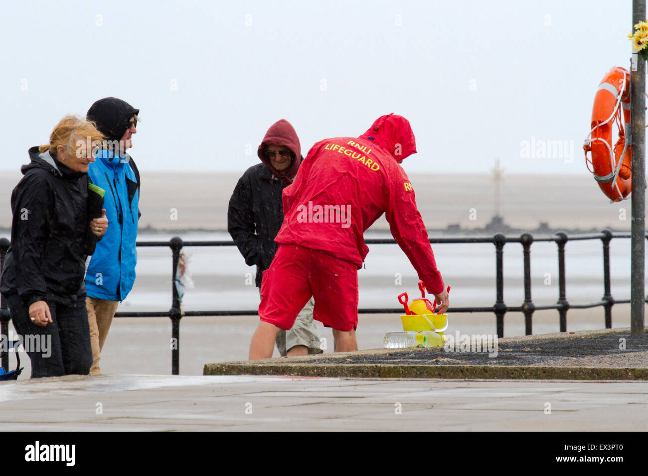 rnli lifeguard sea save rescue rescuer emergency drown drowning water ...