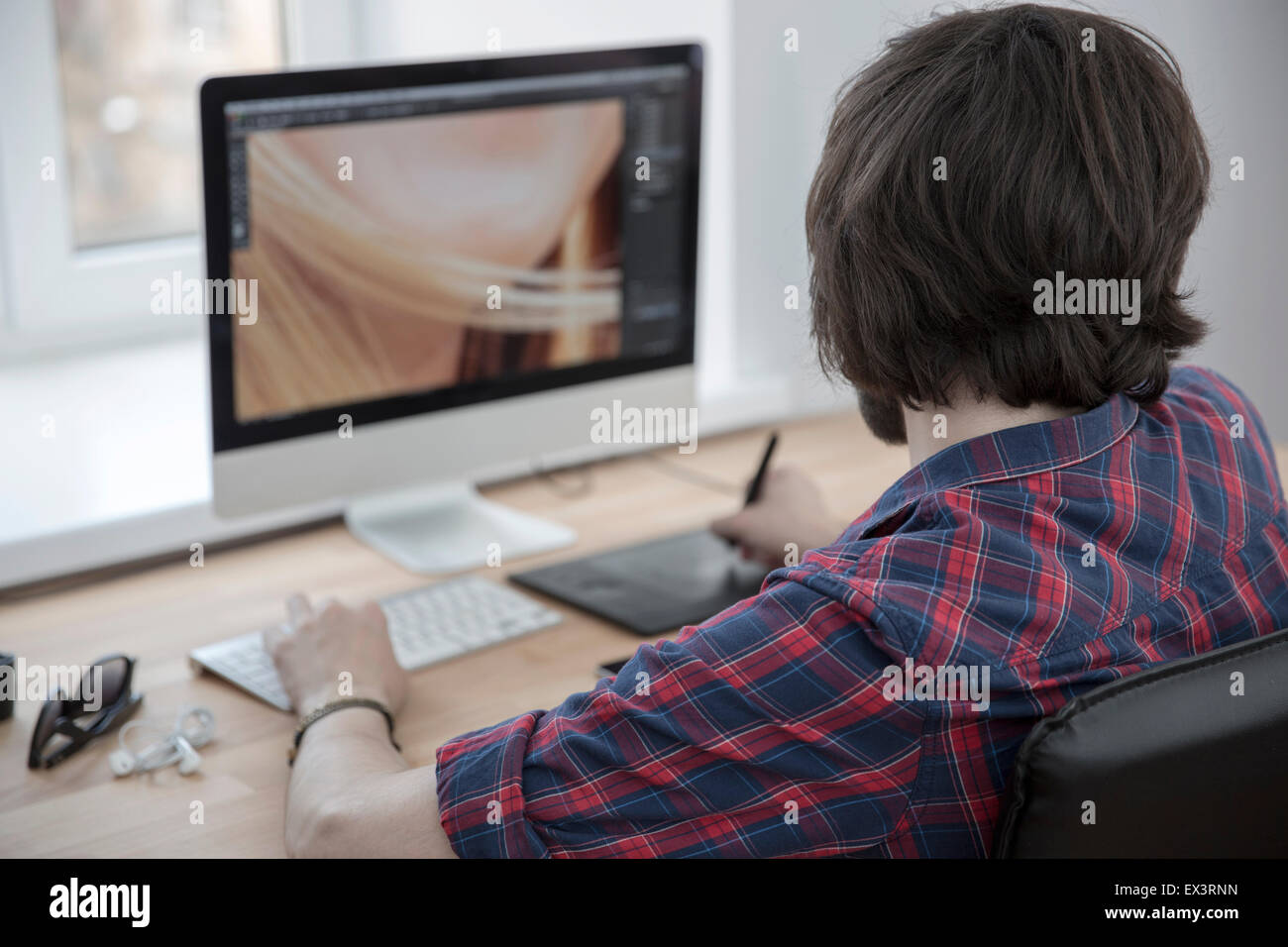 View back of man computer screen hi-res stock photography and images ...