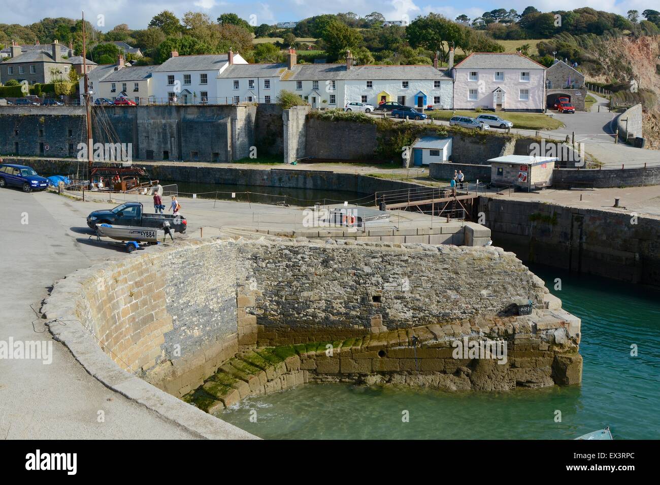Charlestown Harbour and quay with people and houses. Cornwall. England ...