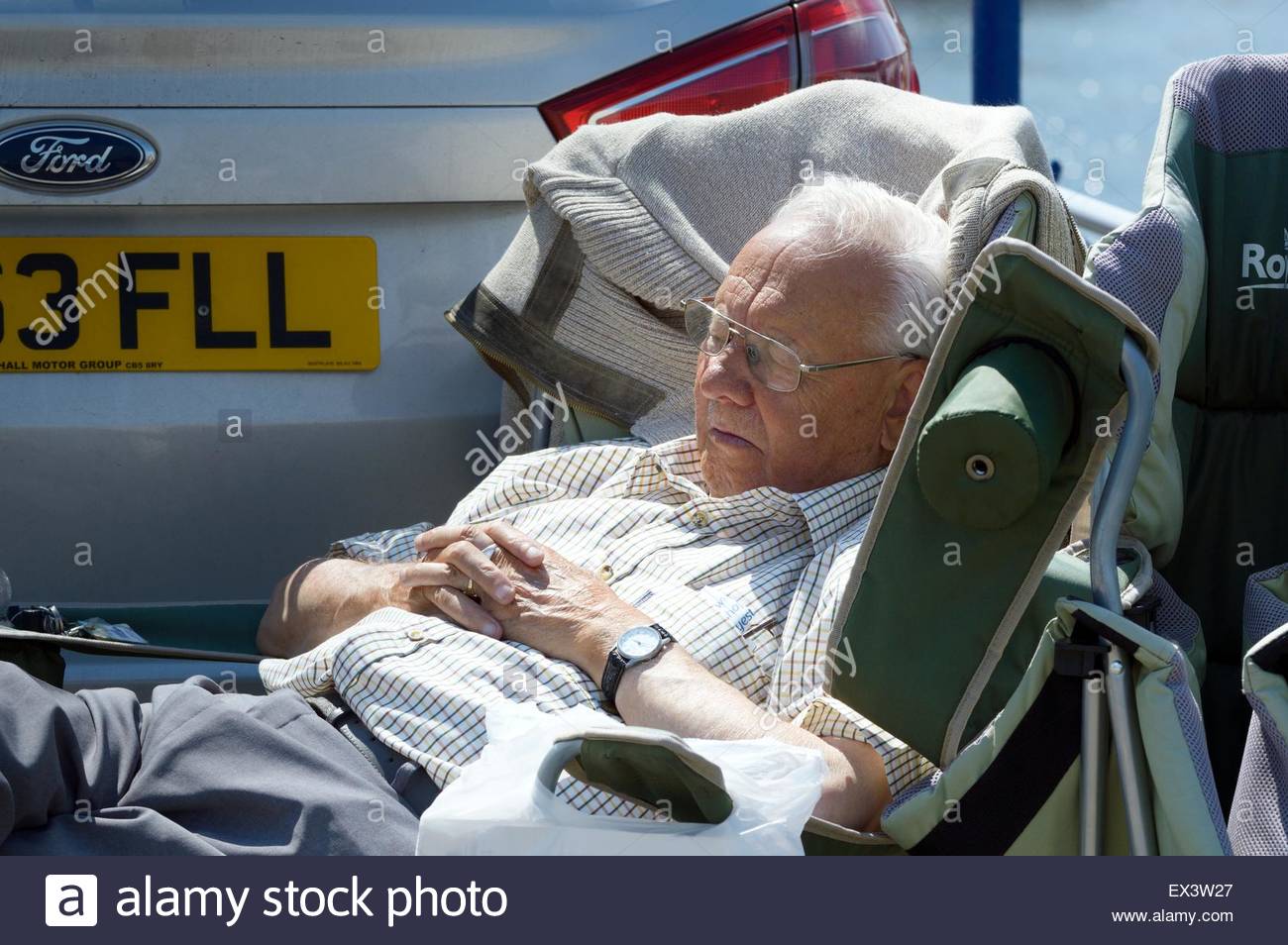 Old Man Sleeping Chair High Resolution Stock Photography and Images - Alamy