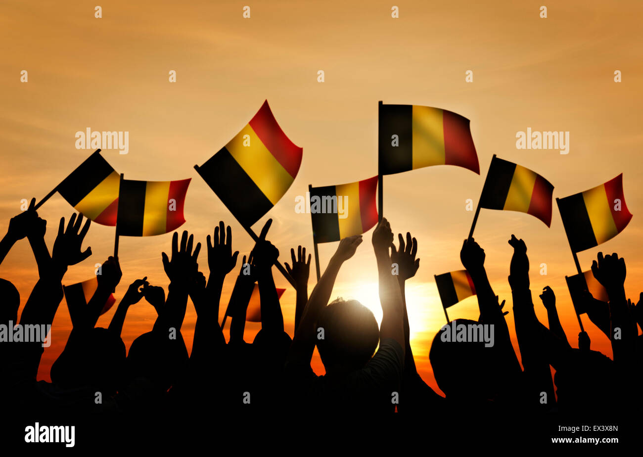 Group of People Waving Belgian Flags in Back Lit Stock Photo - Alamy