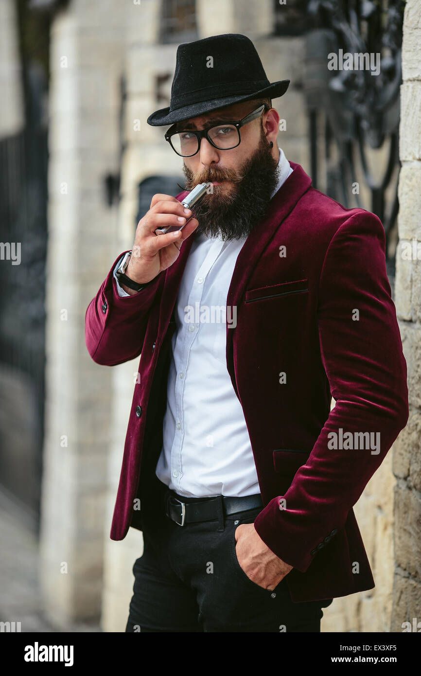 rich man in a jacket near his house Stock Photo - Alamy