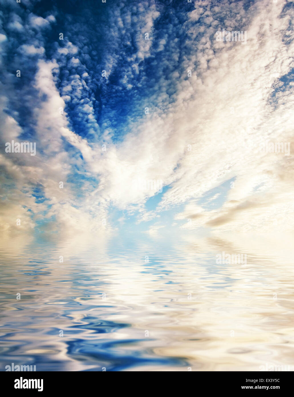 Clouds reflected in water Stock Photo - Alamy