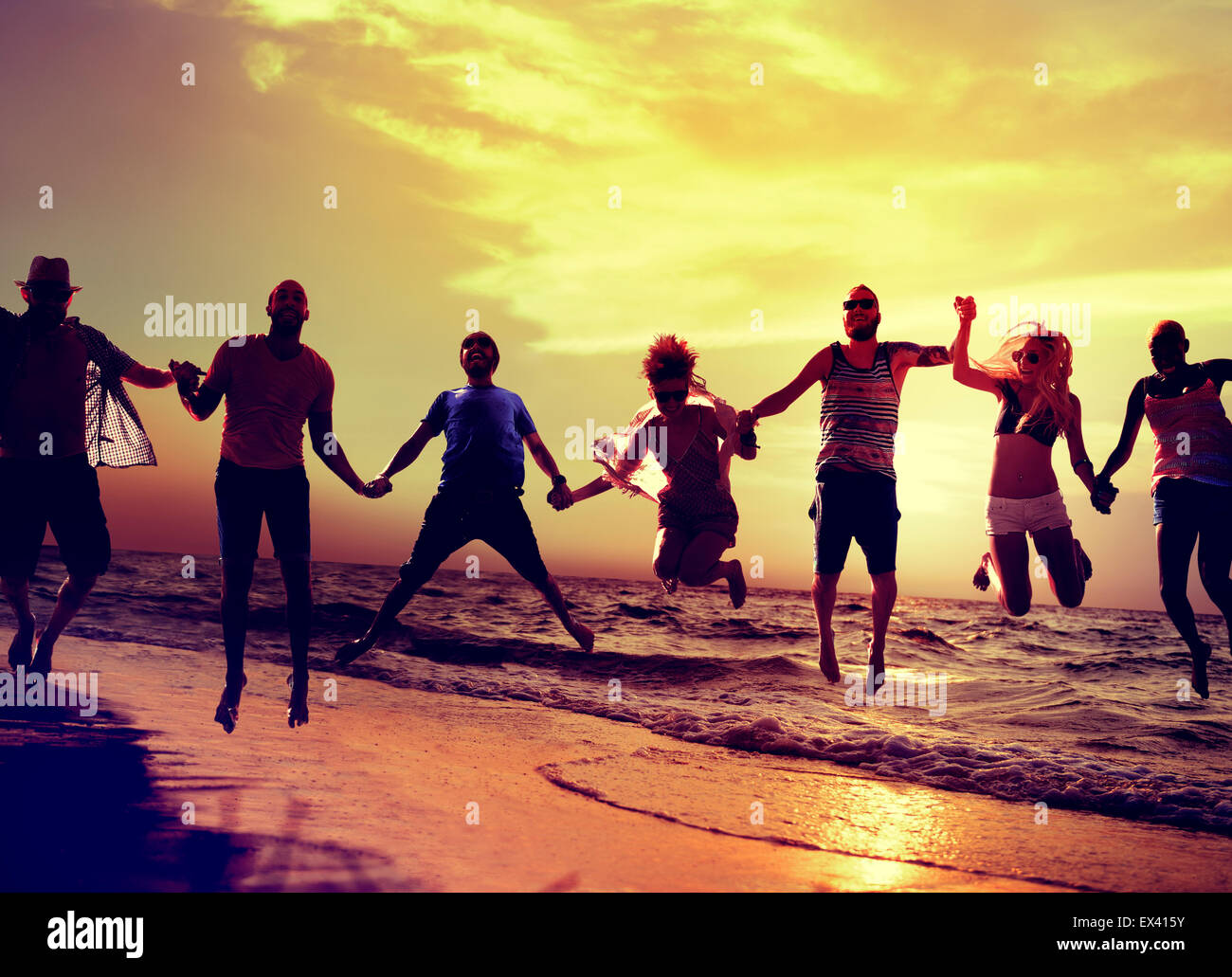 Diverse Beach Summer Friends Fun Jump Shot Concept Stock Photo - Alamy