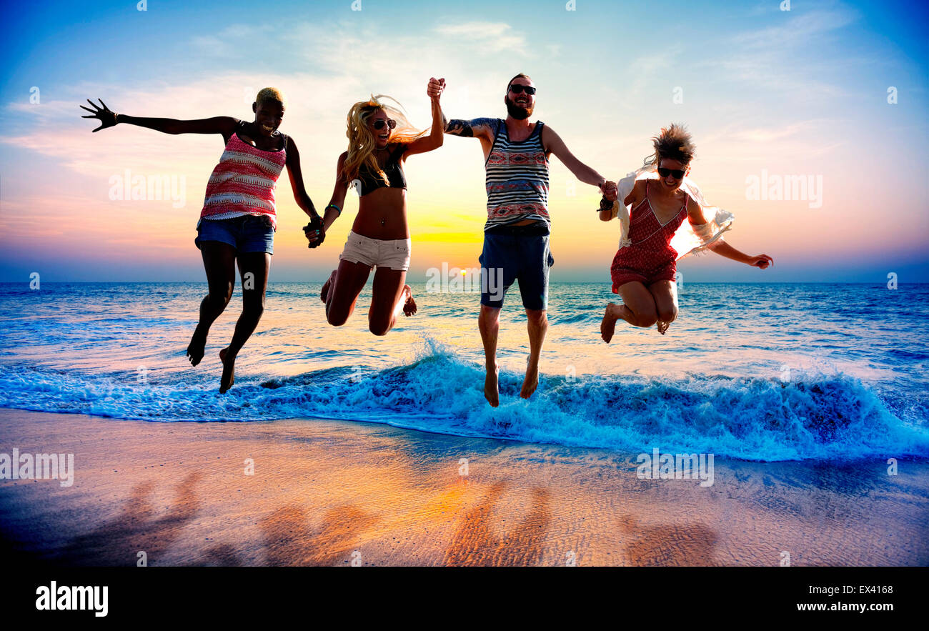 Diverse Beach Summer Friends Fun Jump Shot Concept Stock Photo - Alamy