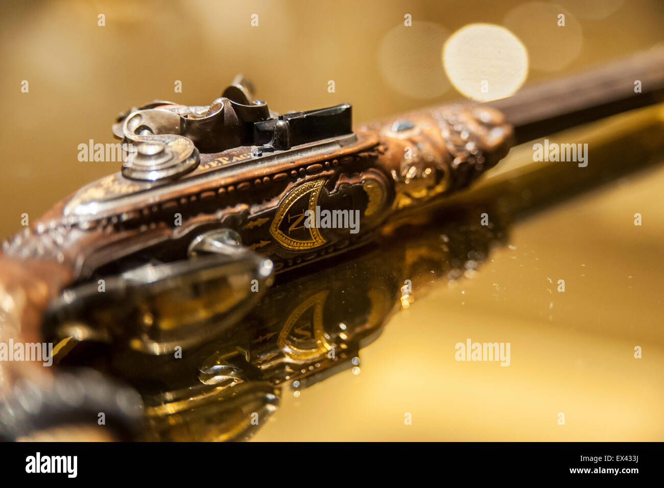 London, UK. 6 July 2015. One of a pair of bespoke gold-encrusted ...