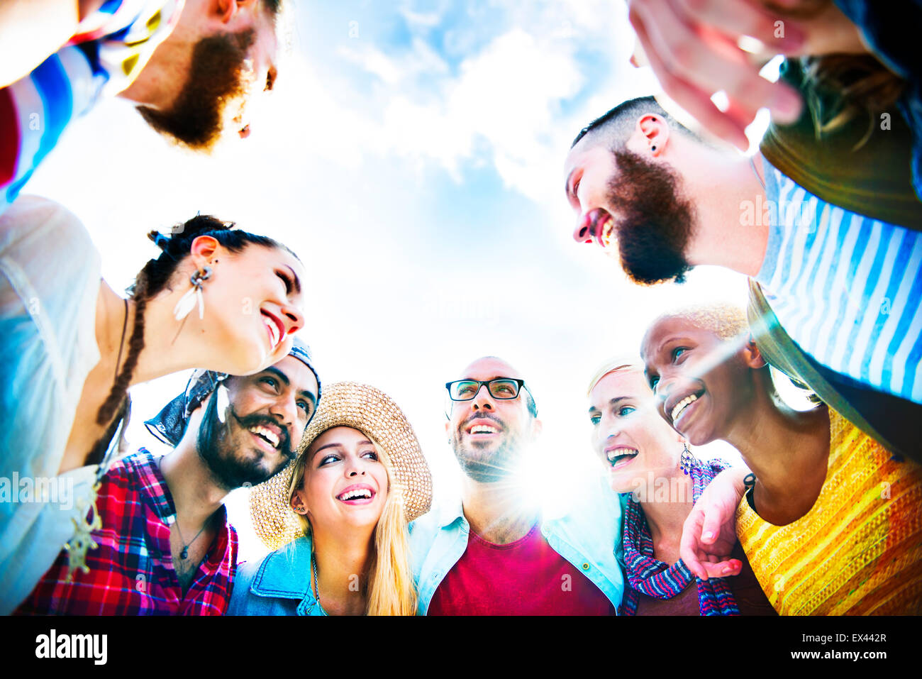 Friendship huddle happiness beach hi-res stock photography and images ...