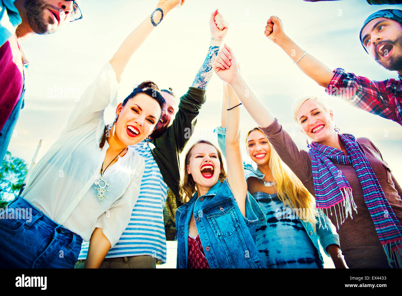 Friends Huddle Join Holiday Party Group Concept Stock Photo - Alamy