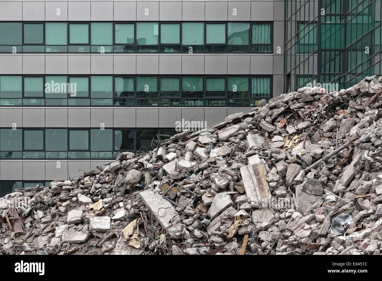 House demolition debris next to modern buildings Stock Photo - Alamy