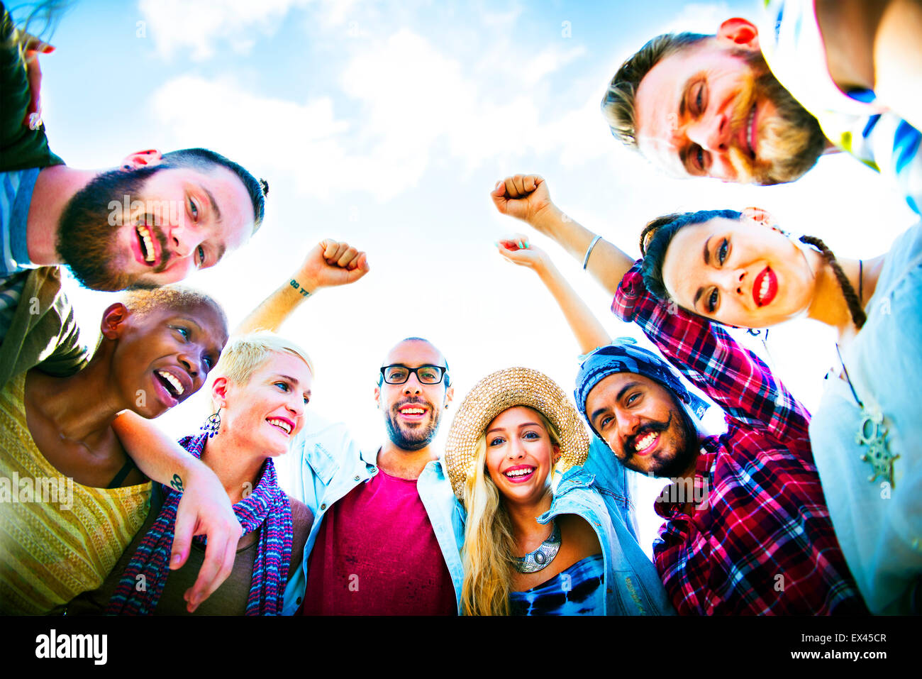 Friends Huddle Join Holiday Party Group Concept Stock Photo - Alamy