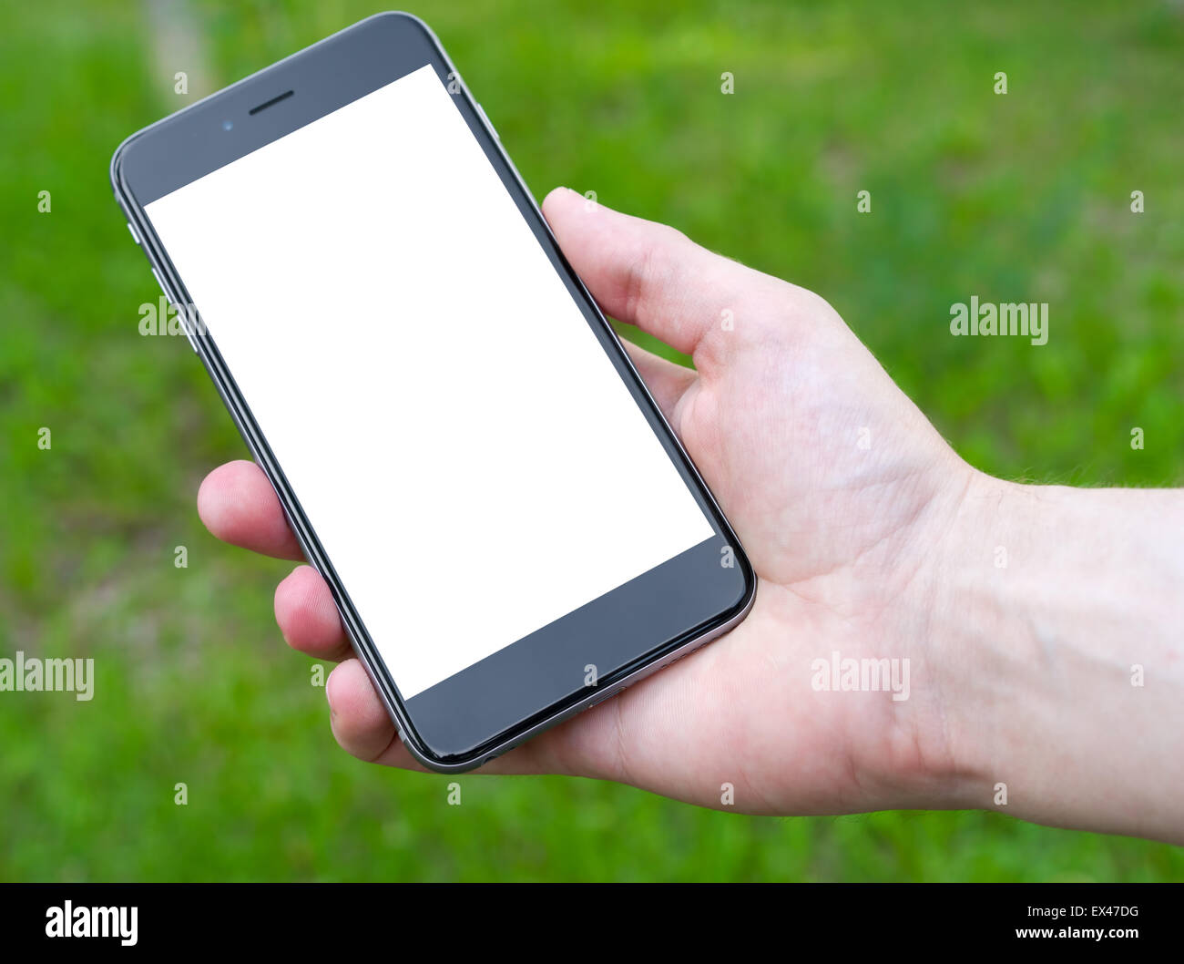 Male hand holding the smartphone with isolated screen Stock Photo - Alamy