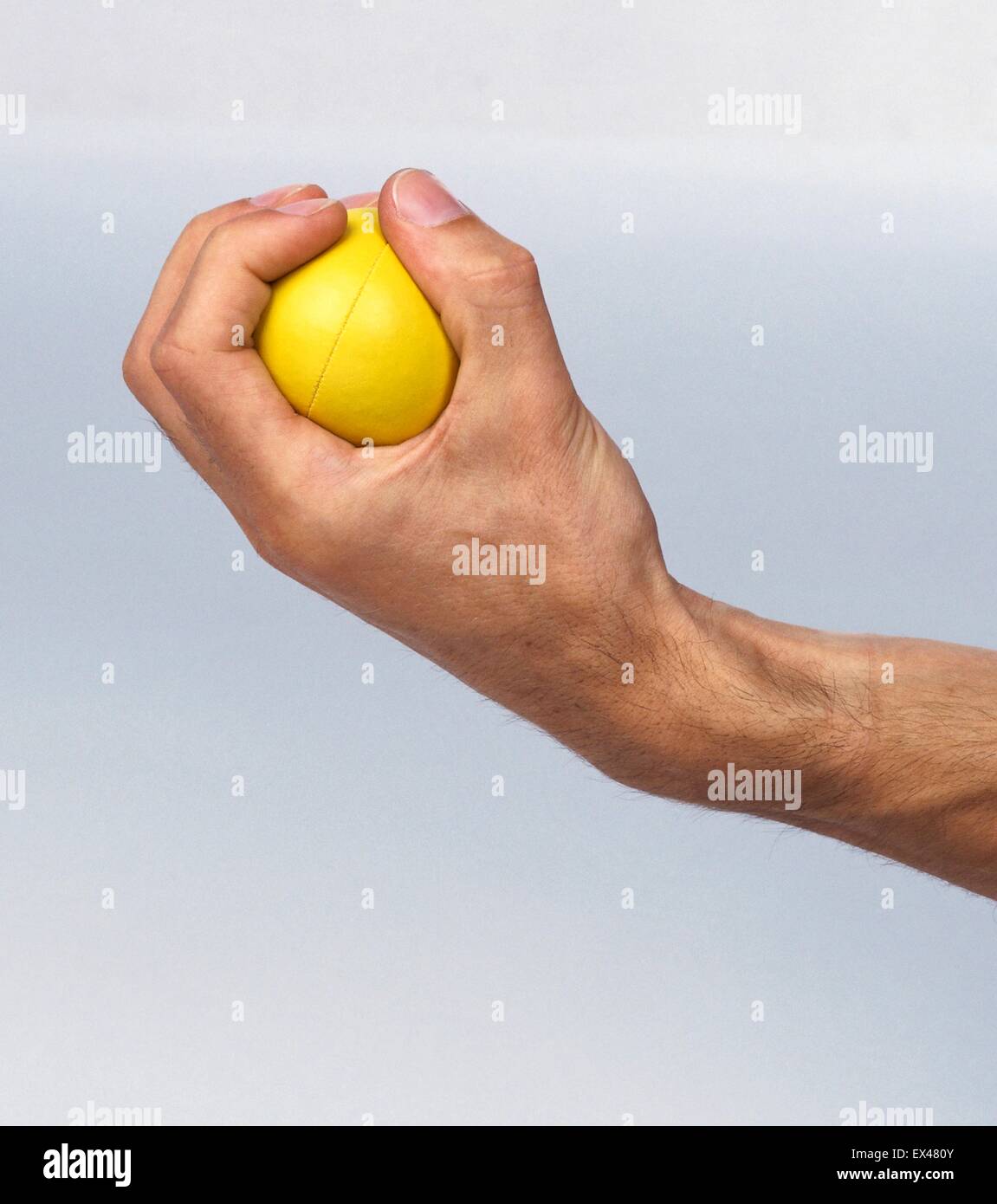 Hand gripping ball hi-res stock photography and images - Alamy