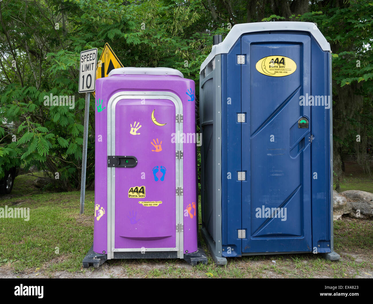 outhouses at a festival, one for adults and one for children, including ...