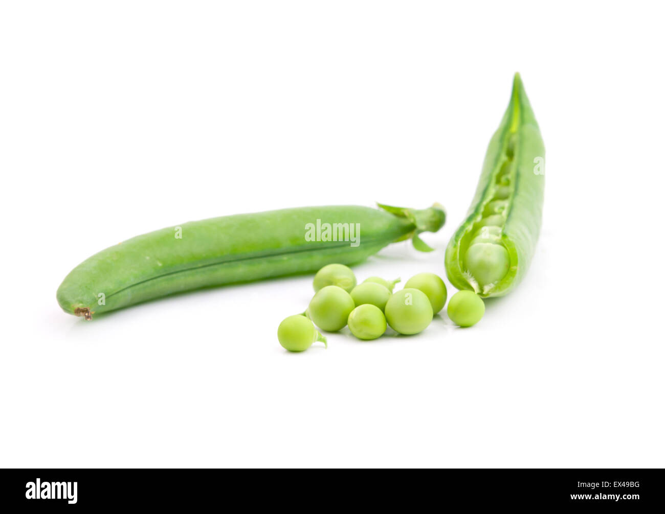 freshly green sugar snap peas on white background Stock Photo - Alamy
