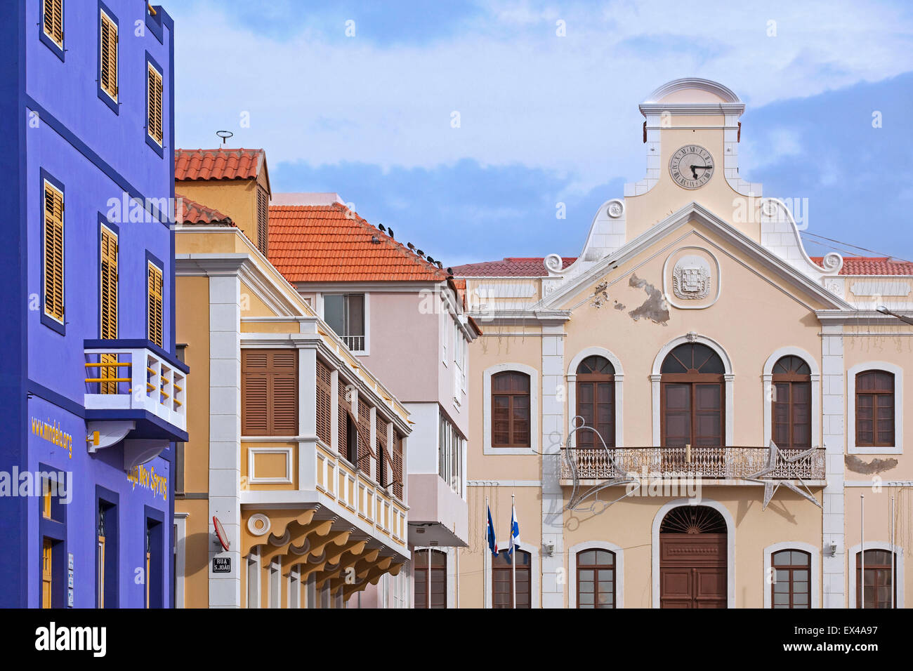 Colourful renovated colonial buildings and the town hall in the ...