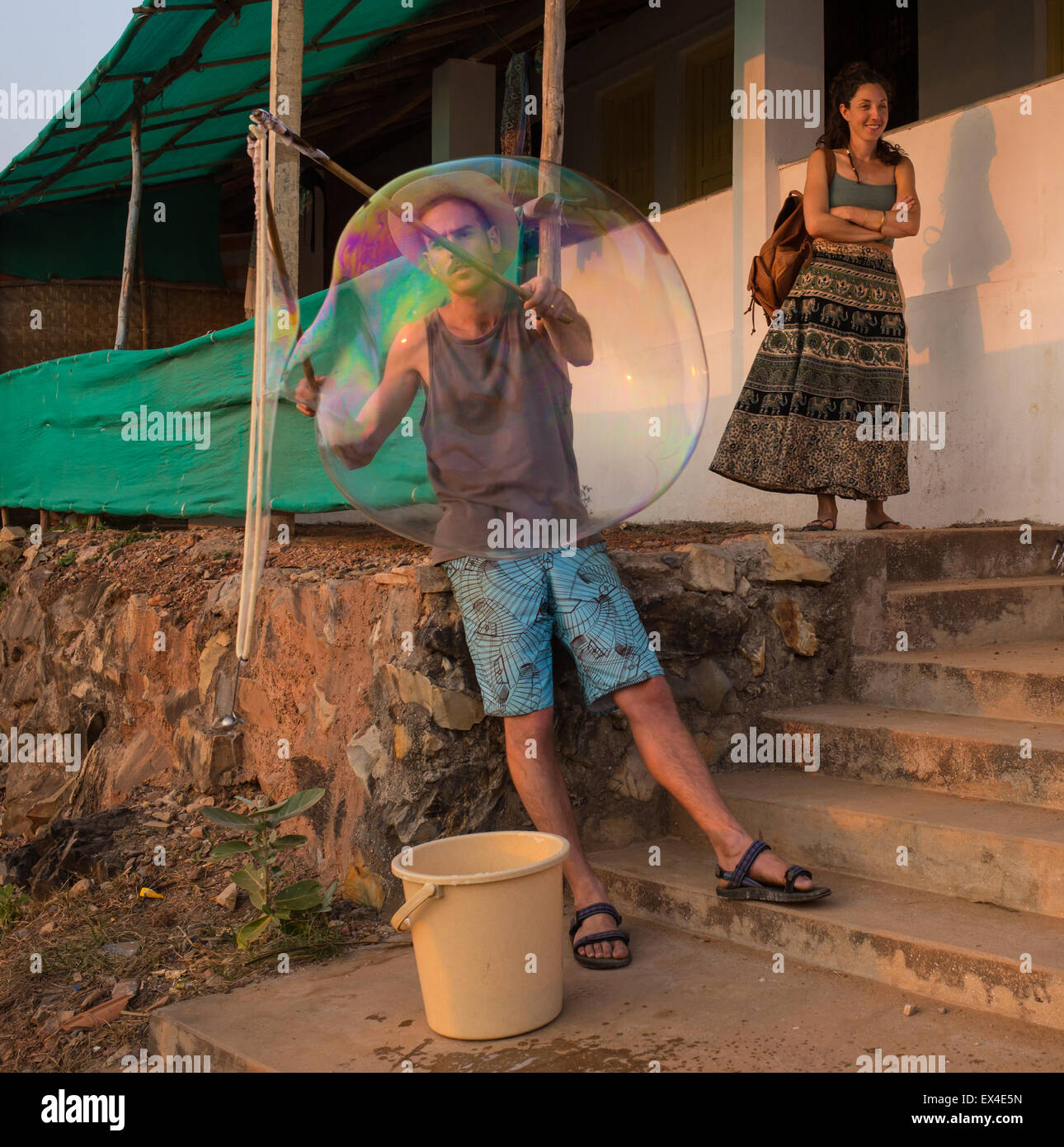 Dj playing summer hits at sunset beach party with trumpet jazz ...