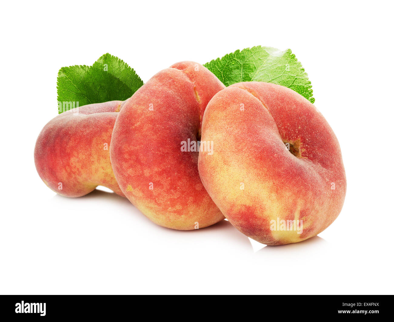 ripe fig peach with leaves isolated on white background Stock Photo - Alamy