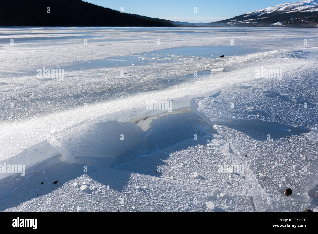 Cracked ice on lake in Aare, Sweden Stock Photo - Alamy