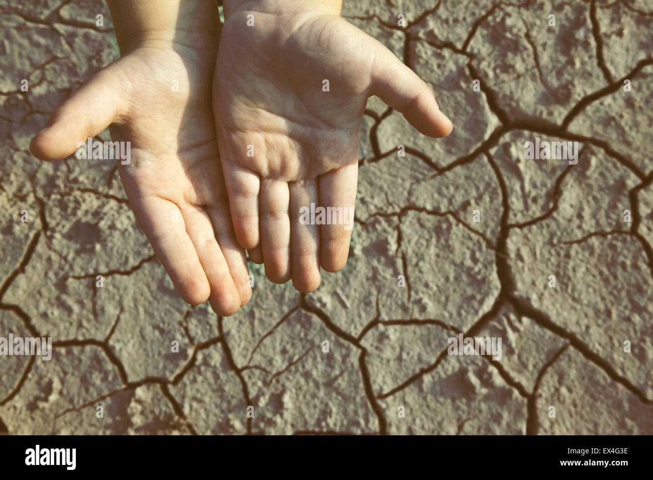 Hands outstretched in a gesture of help Stock Photo - Alamy