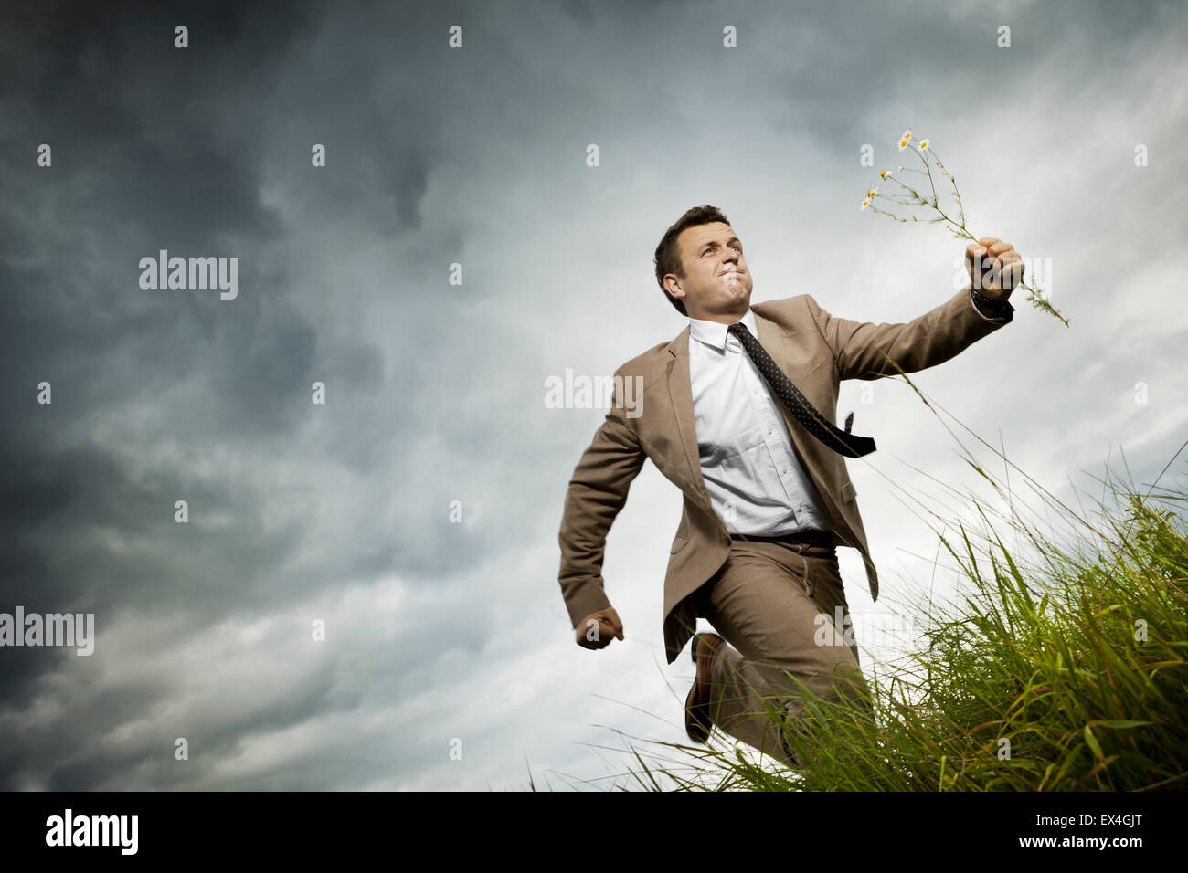 Young happy man running suit hi-res stock photography and images - Alamy