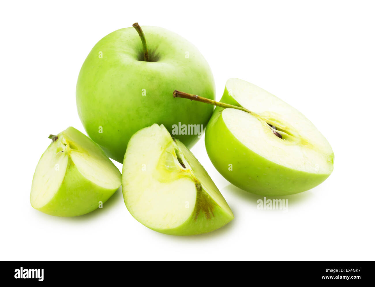 green apples and apple slices on white background Stock Photo - Alamy