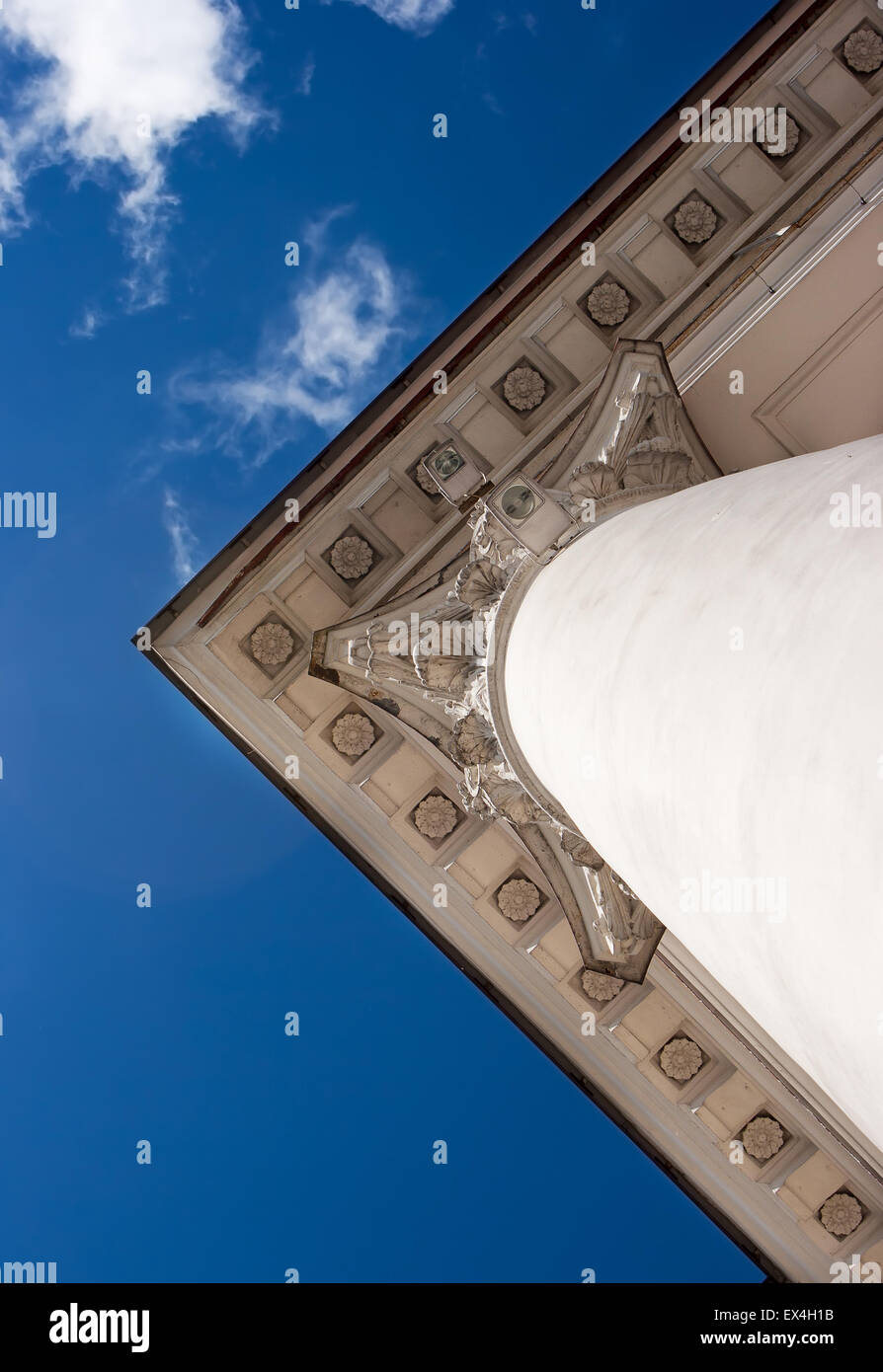 white column and a fragment of the roof of the old building. bottom ...