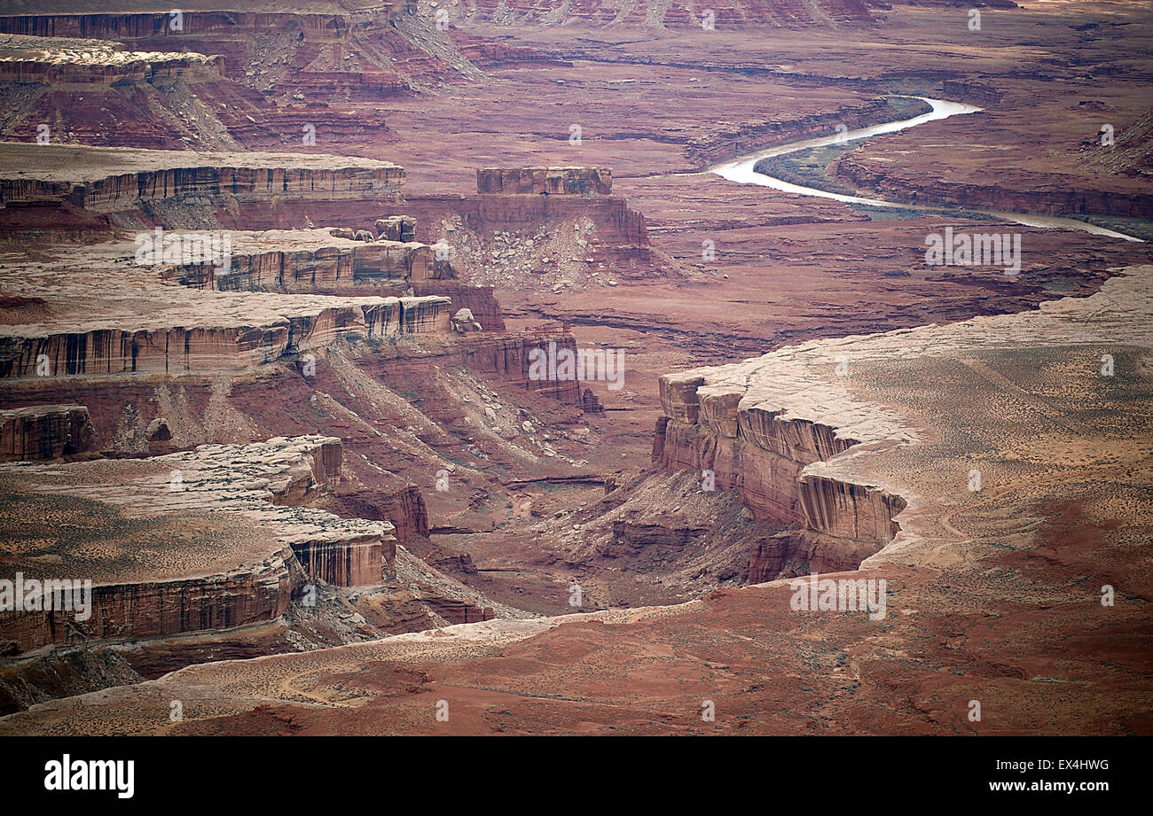 An ancient river flows through Utah's desert canyons near Moab and ...