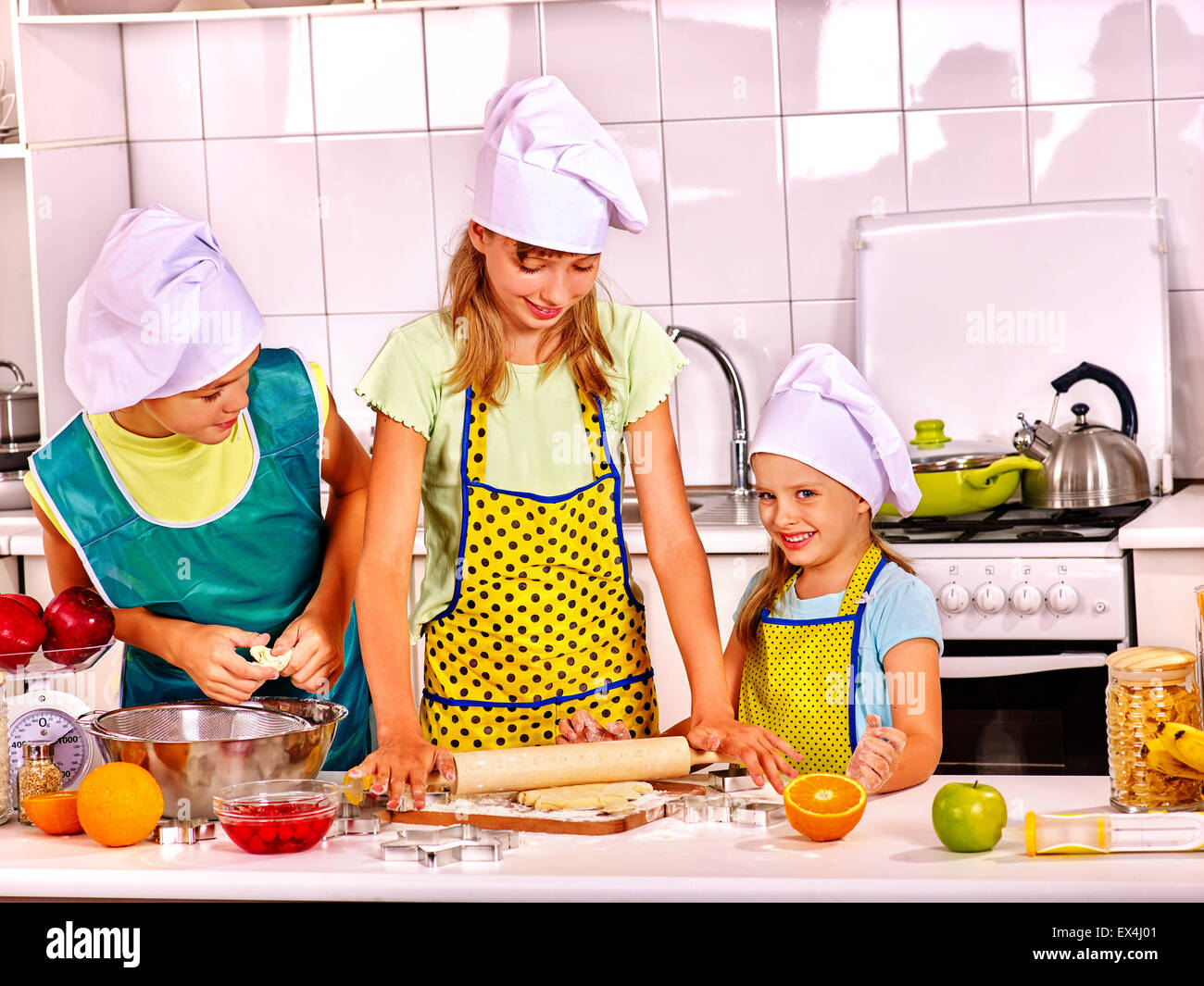 Happy female chef children hi-res stock photography and images - Alamy